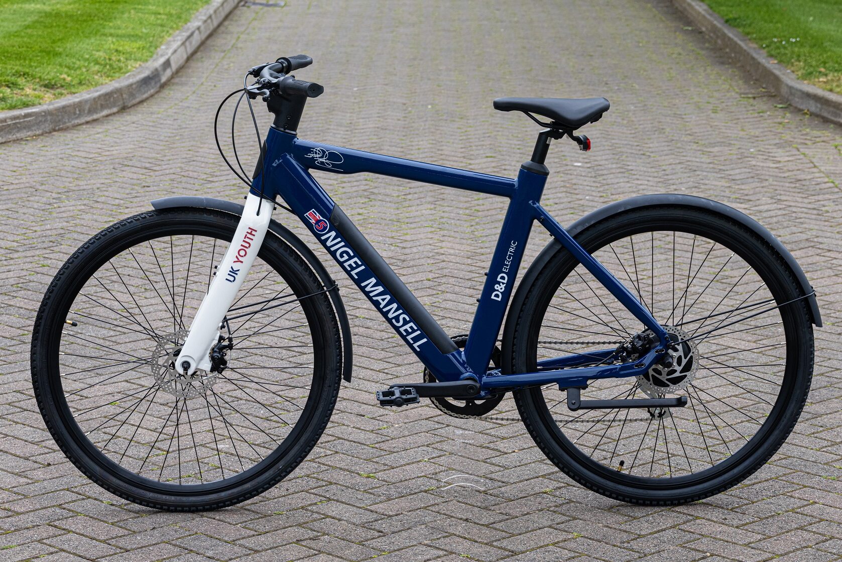 New Nigel Mansell electric bike raising money for UK Youth - UK Youth