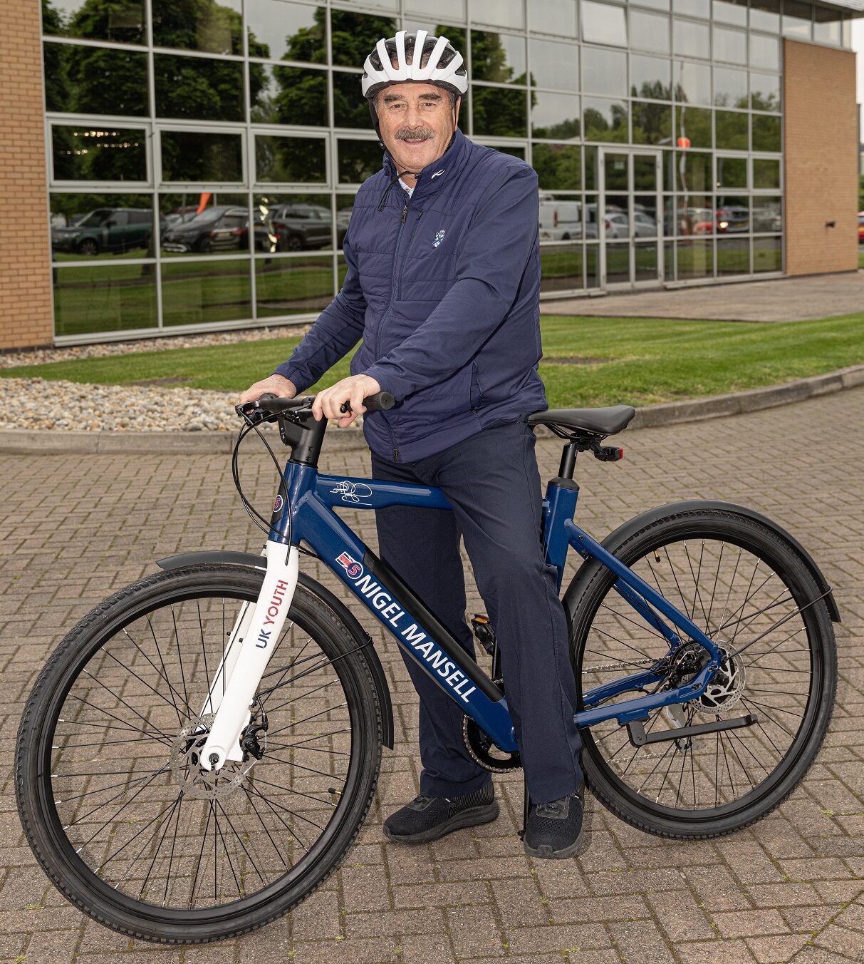 New Nigel Mansell electric bike raising money for UK Youth - UK Youth